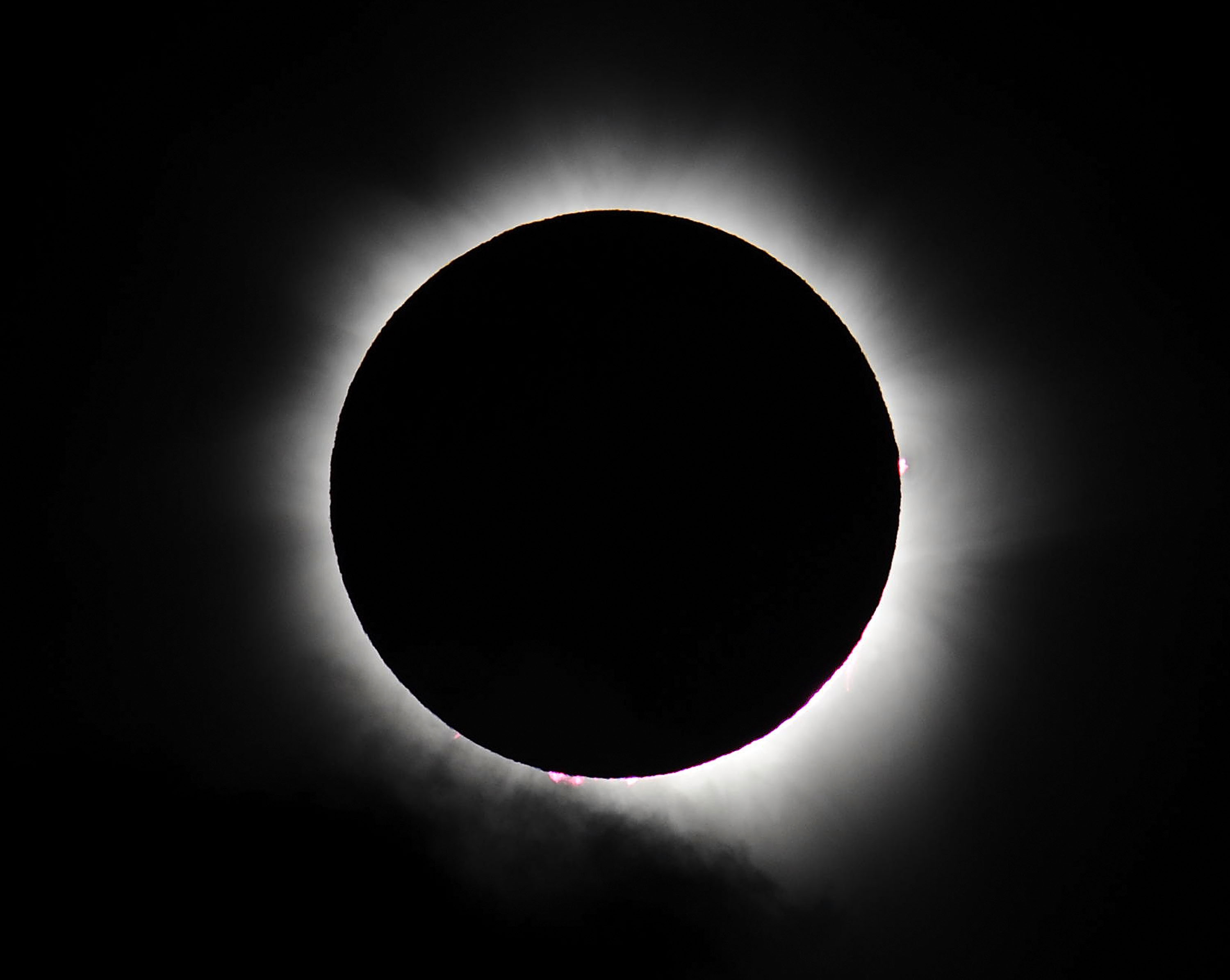 PHOTOS: Total solar eclipse seen from Australia's far north - The World ...