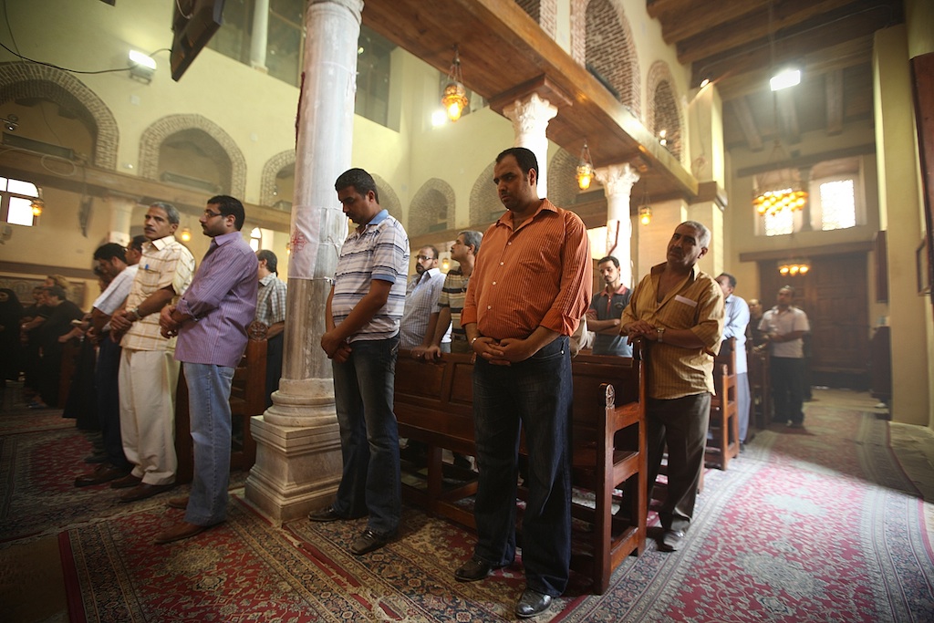 Coptic Christians remain in eye of the storm as protests subside - The ...