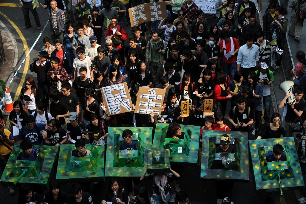 Thousands demonstrate against Beijing's alleged interference in Hong ...