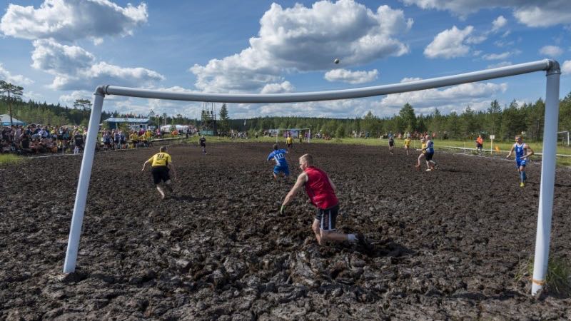 In waist-deep mud, soccer played in slow motion at swamp World Cup ...