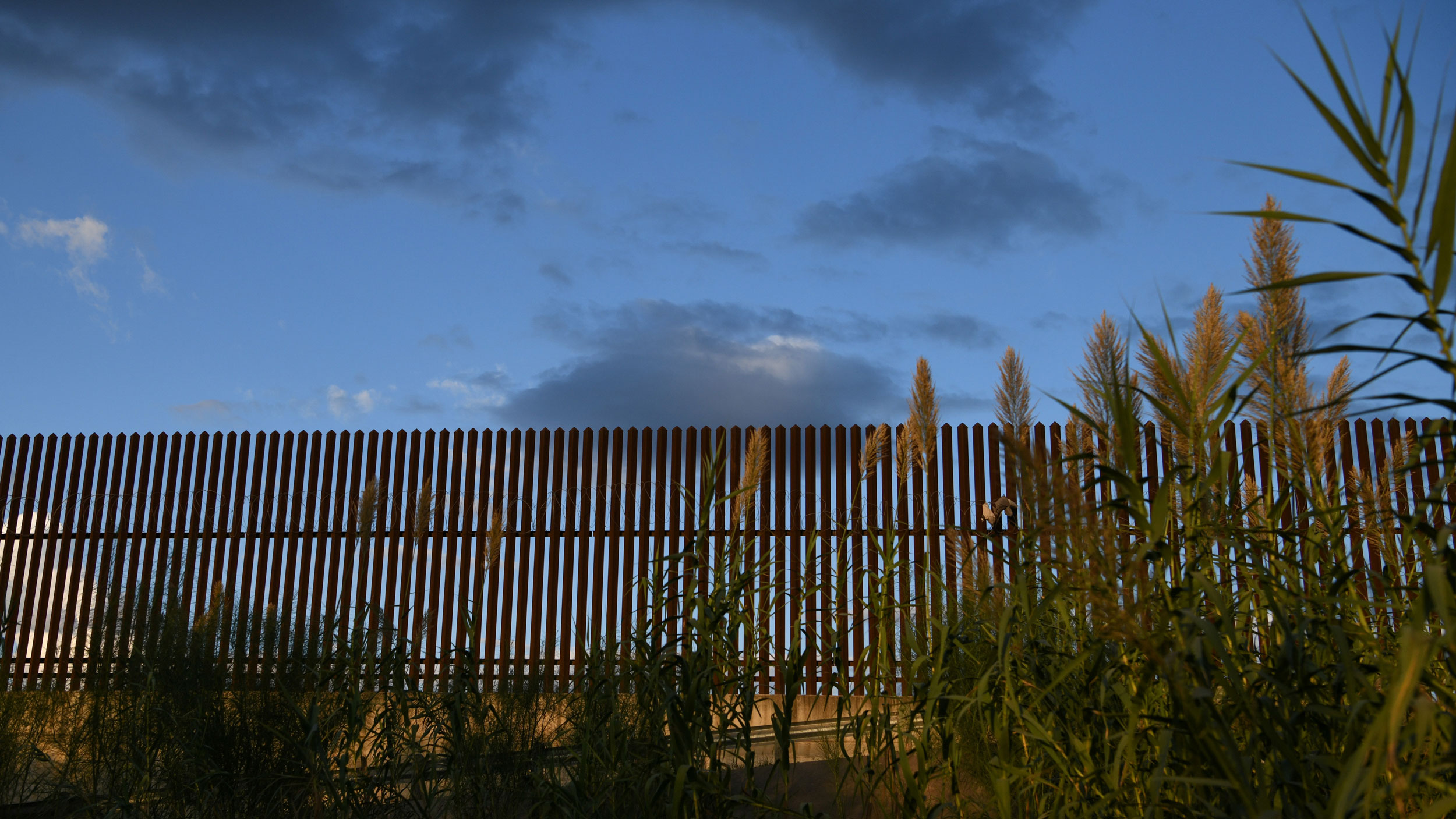 Federal judge bars Trump from building border wall with military funds ...
