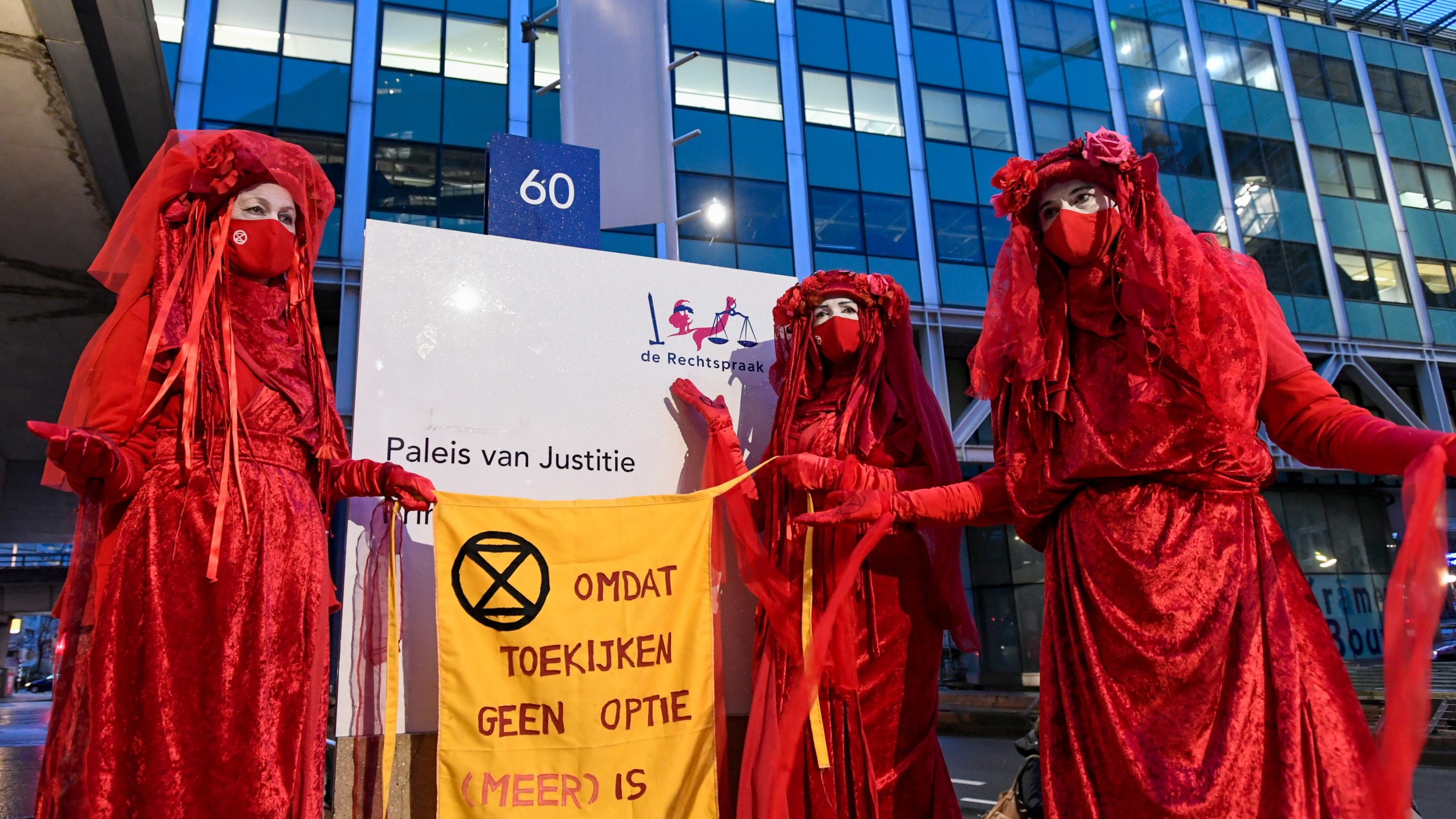 Climate activists are taking their case to court — at The Hague and ...