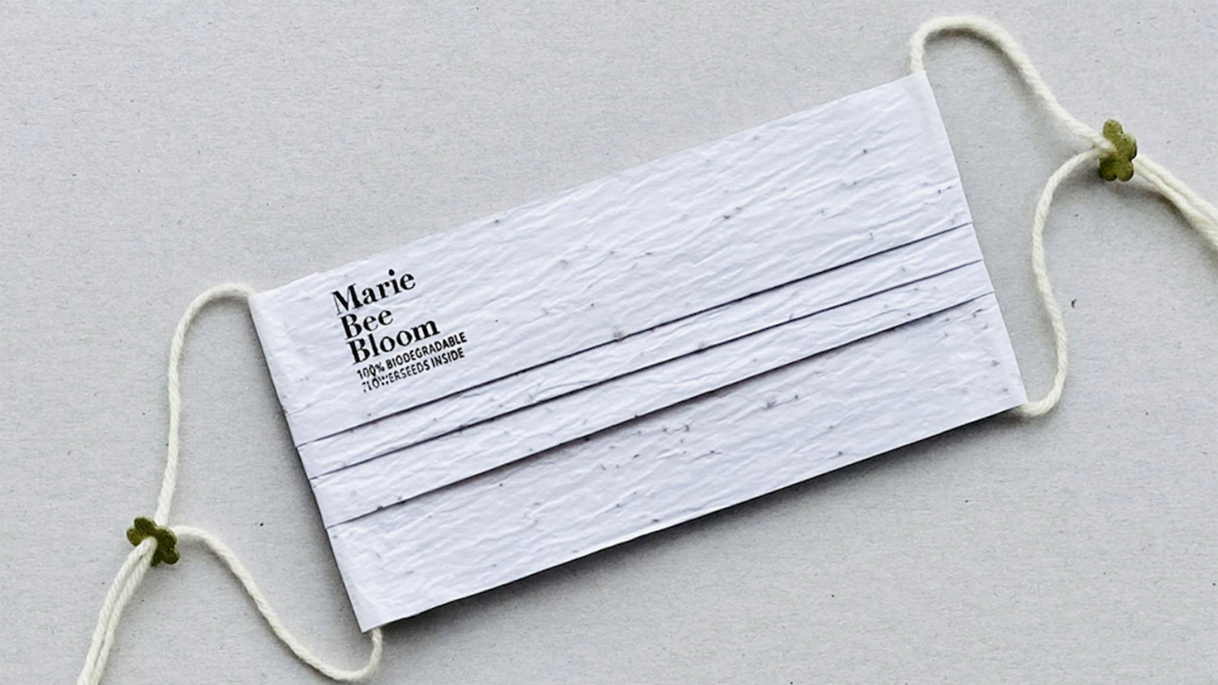 Graphic designer creates biodegradable masks that bloom flowers when ...