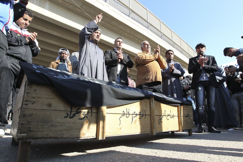 Insurgents storm Iraqi police compound - The World from PRX