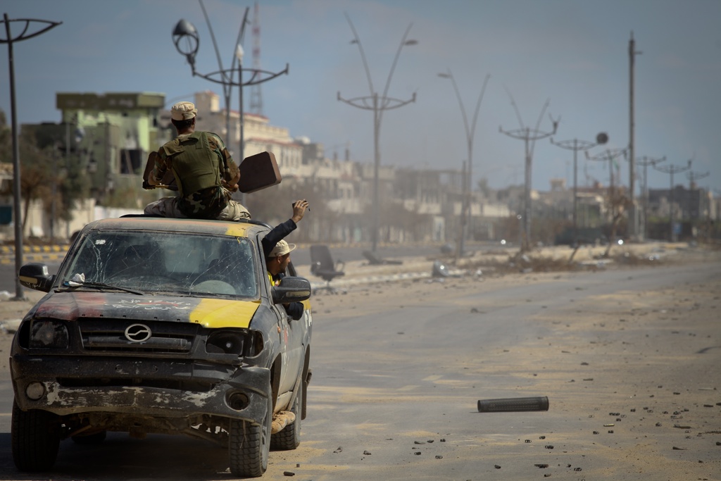 Like battlefield tourists, Libyan rebels film the fight - The World ...