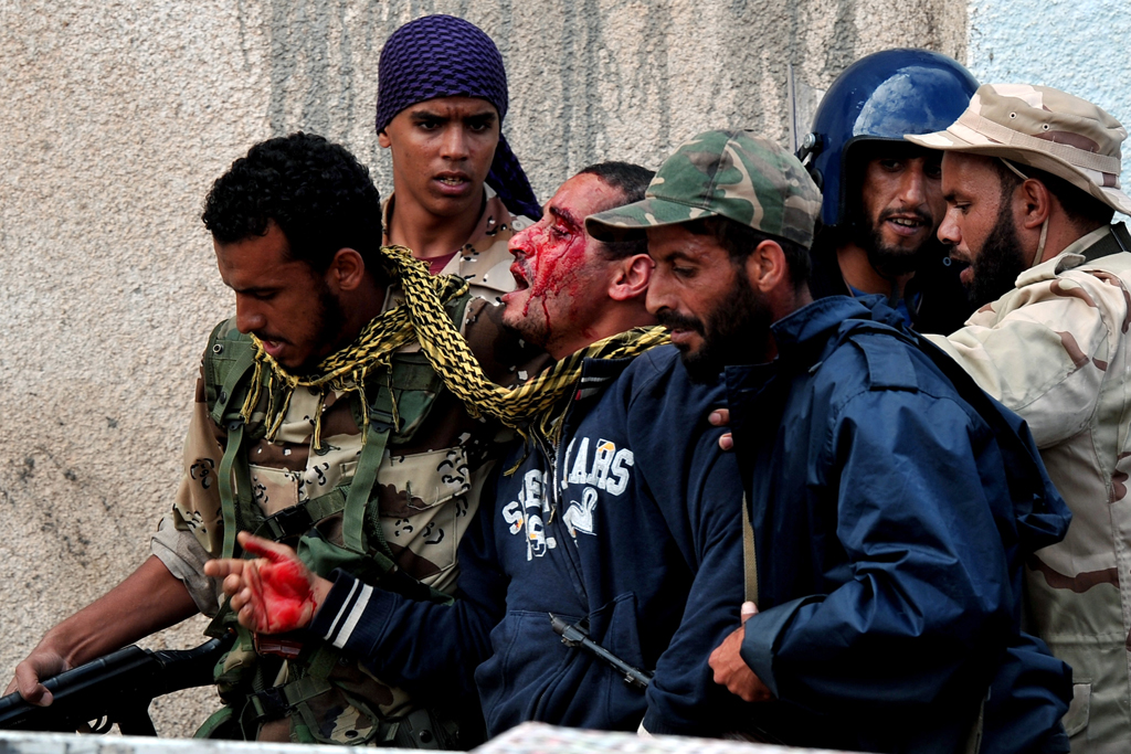 Libya rebels 'executed' Gaddafi loyalists, says rights group (VIDEO ...