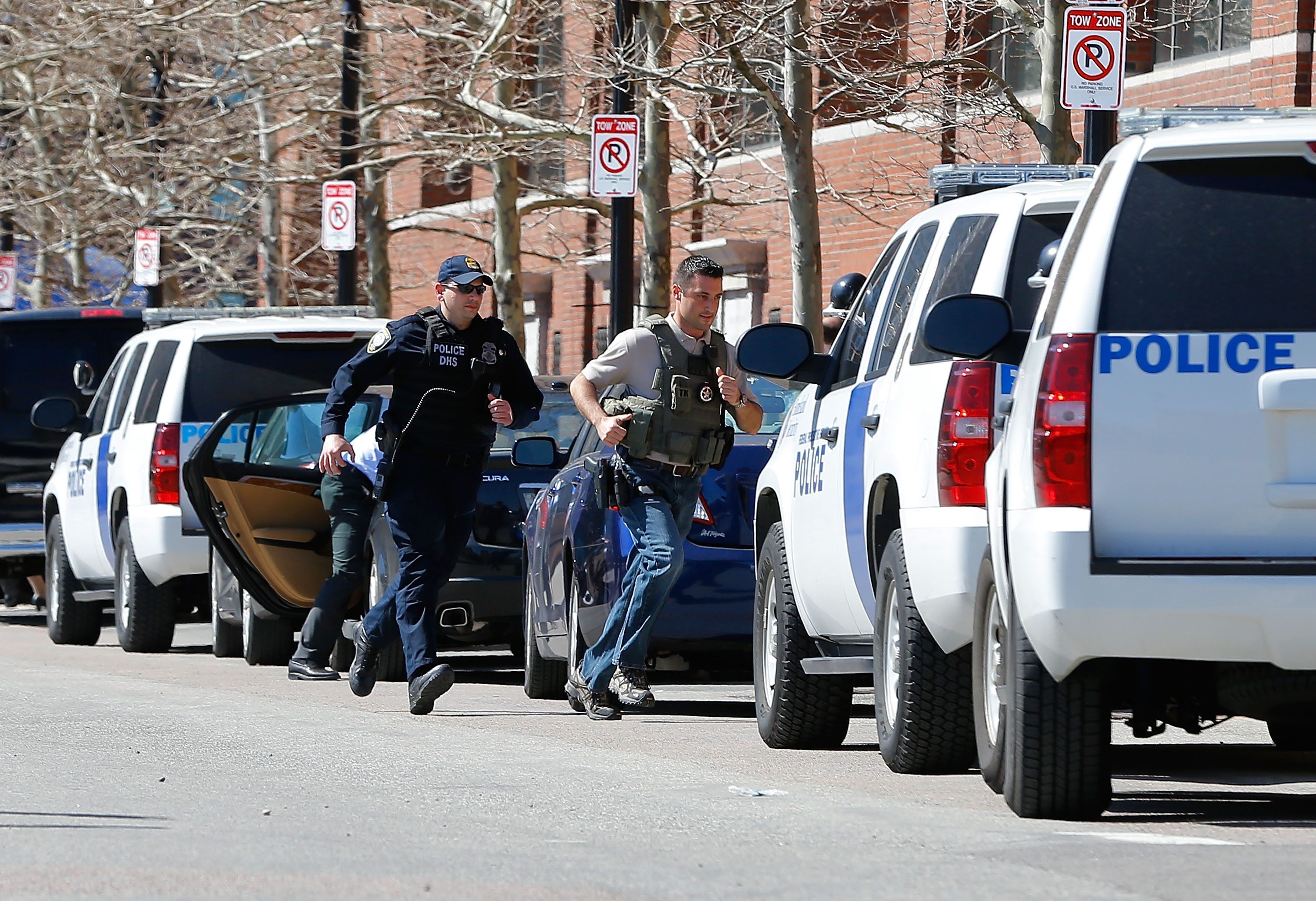 Boston Marathon bombing: Two suspects spotted carrying backpacks and ...