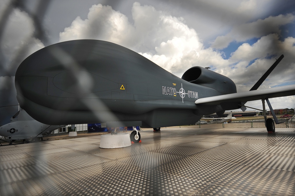 Armed drones flown remotely from Britain air bases prompt protests ...