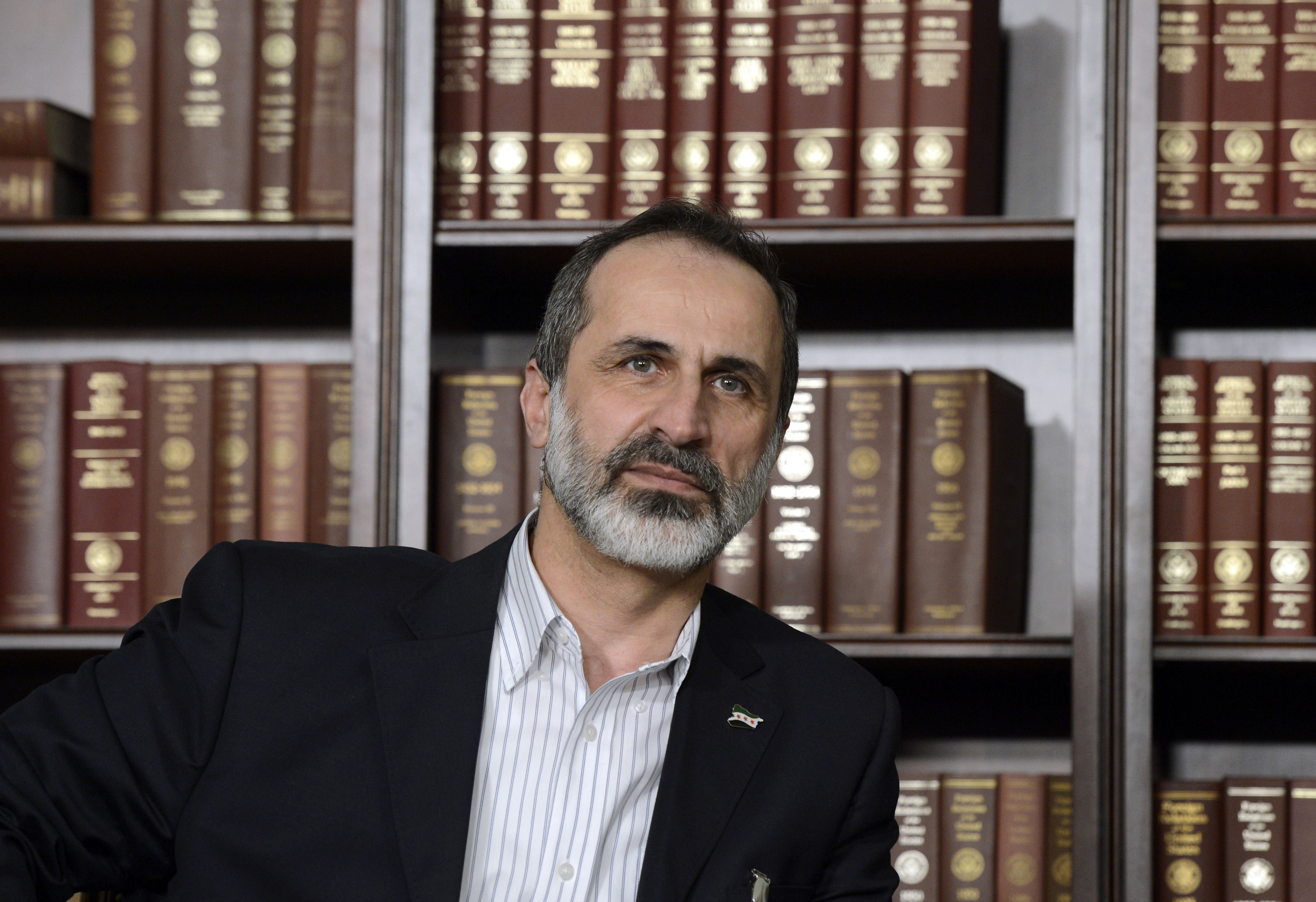 Syrian opposition leader calls for dialogue, wants direct talks with ...