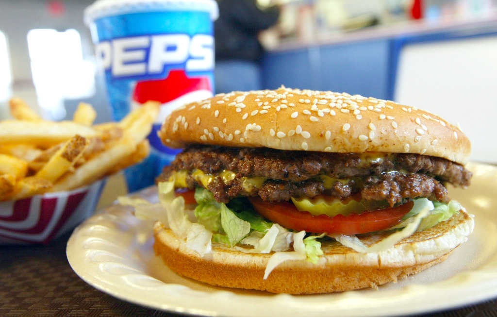 "Broken cheeseburger" kissed by autistic girl in Facebook photo gone ...