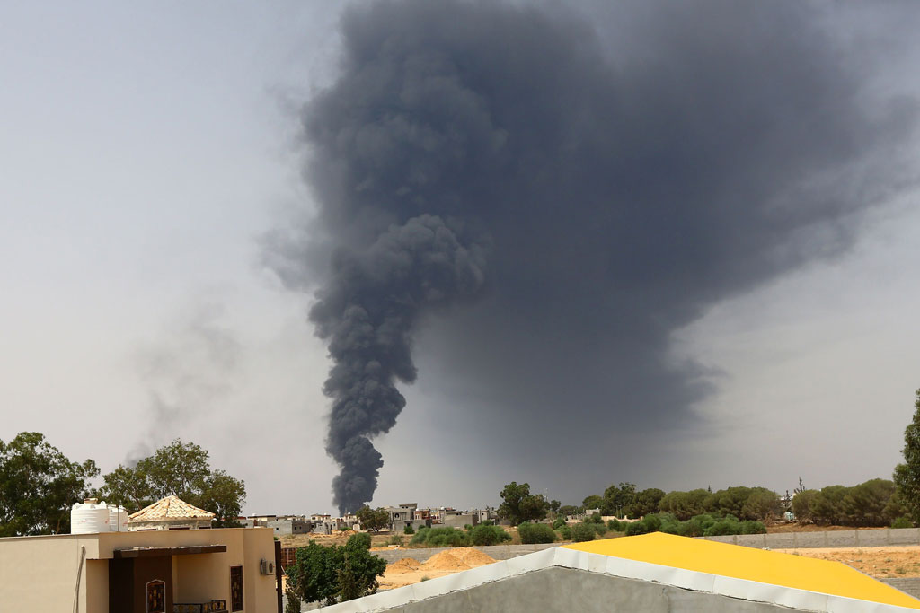 Huge blaze at a fuel depot in Tripoli is 'out of control' as Libya ...