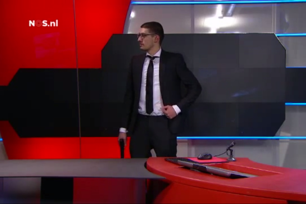 Watch footage of the gunman who briefly took over a Dutch TV studio ...