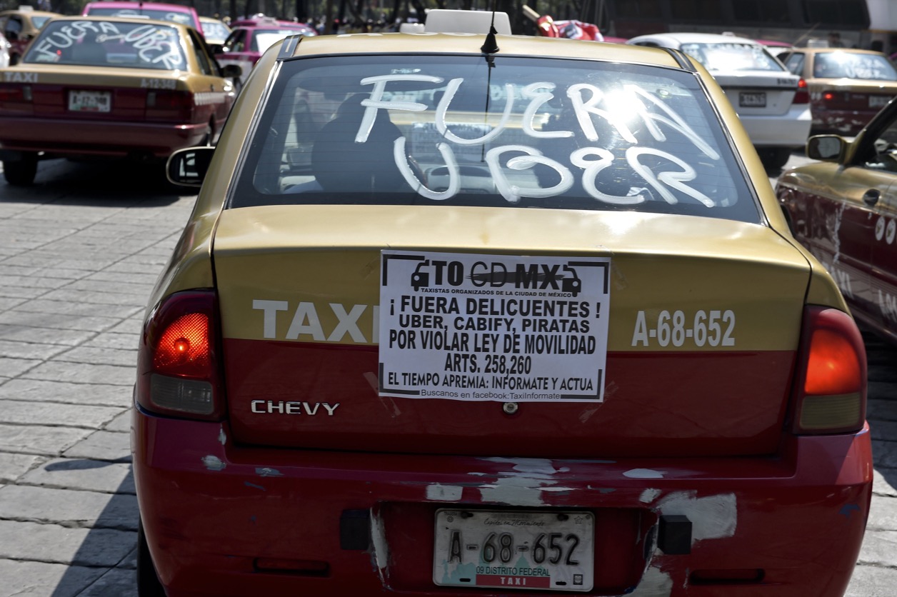 Mexican taxis promise to 'hunt down' Uber drivers - The World from PRX
