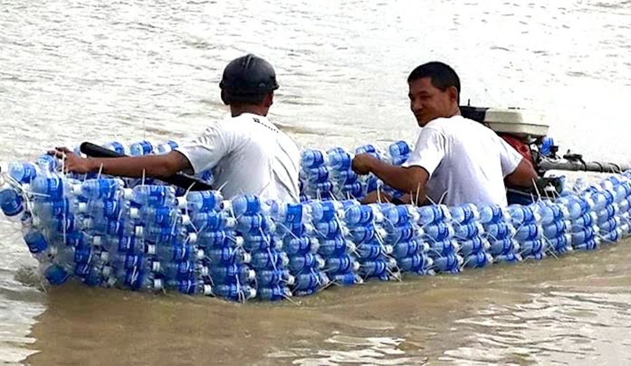 DIY sailor in flooded Myanmar invents boat made from trash - The World ...