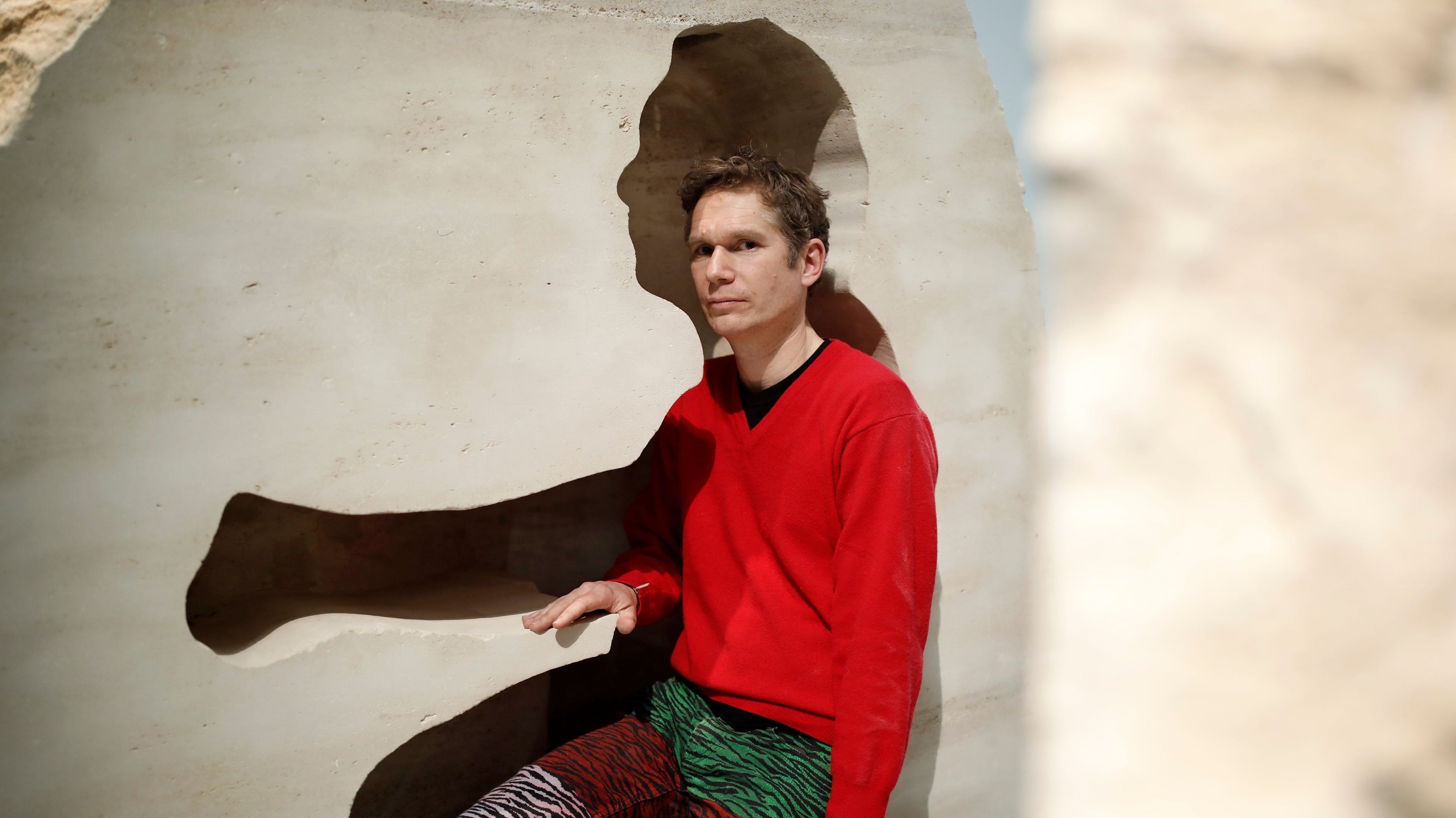 This French performance artist has entombed himself inside a boulder ...