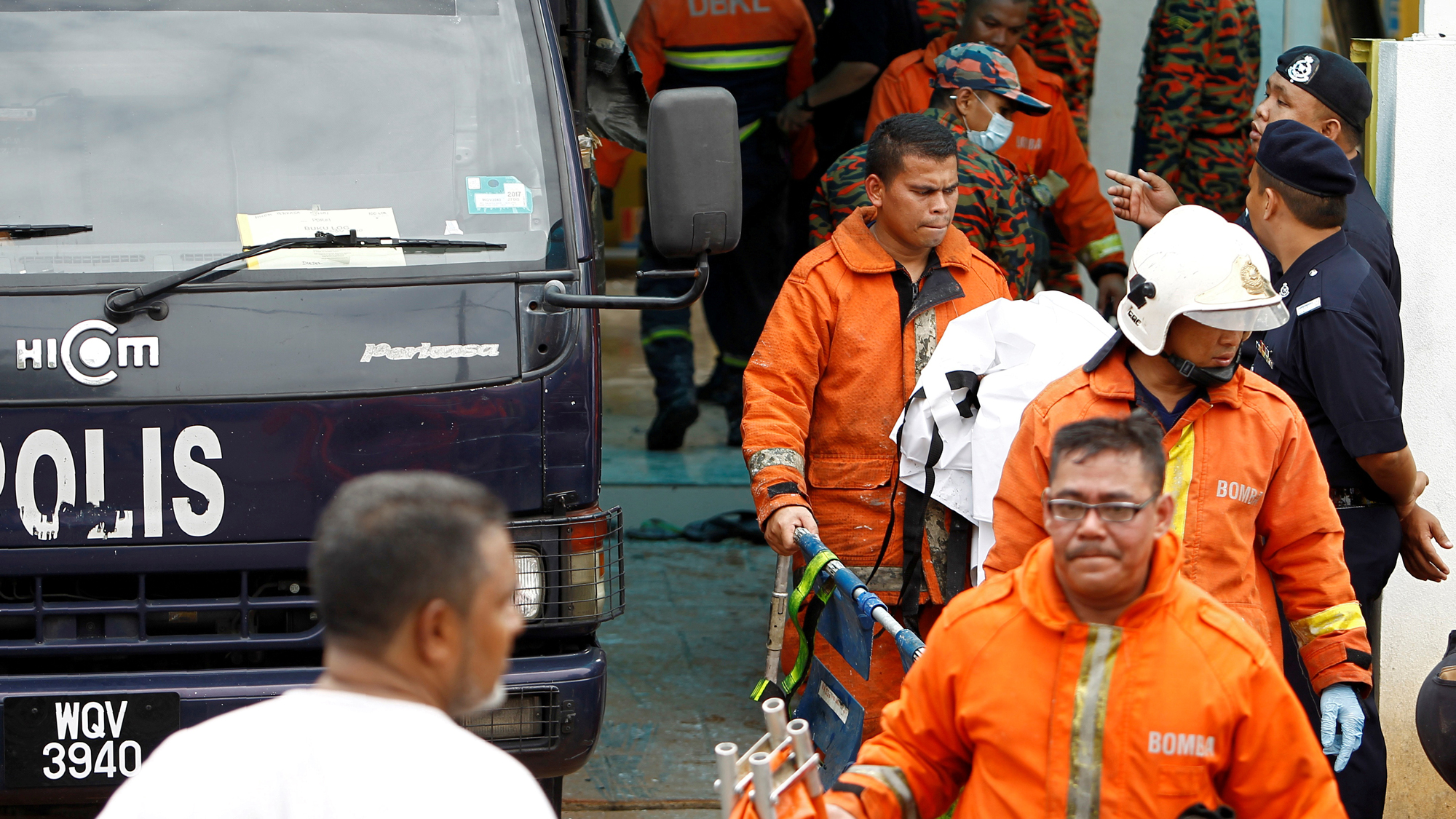 A school fire in Malaysia kills 23 children and teachers as neighbors ...