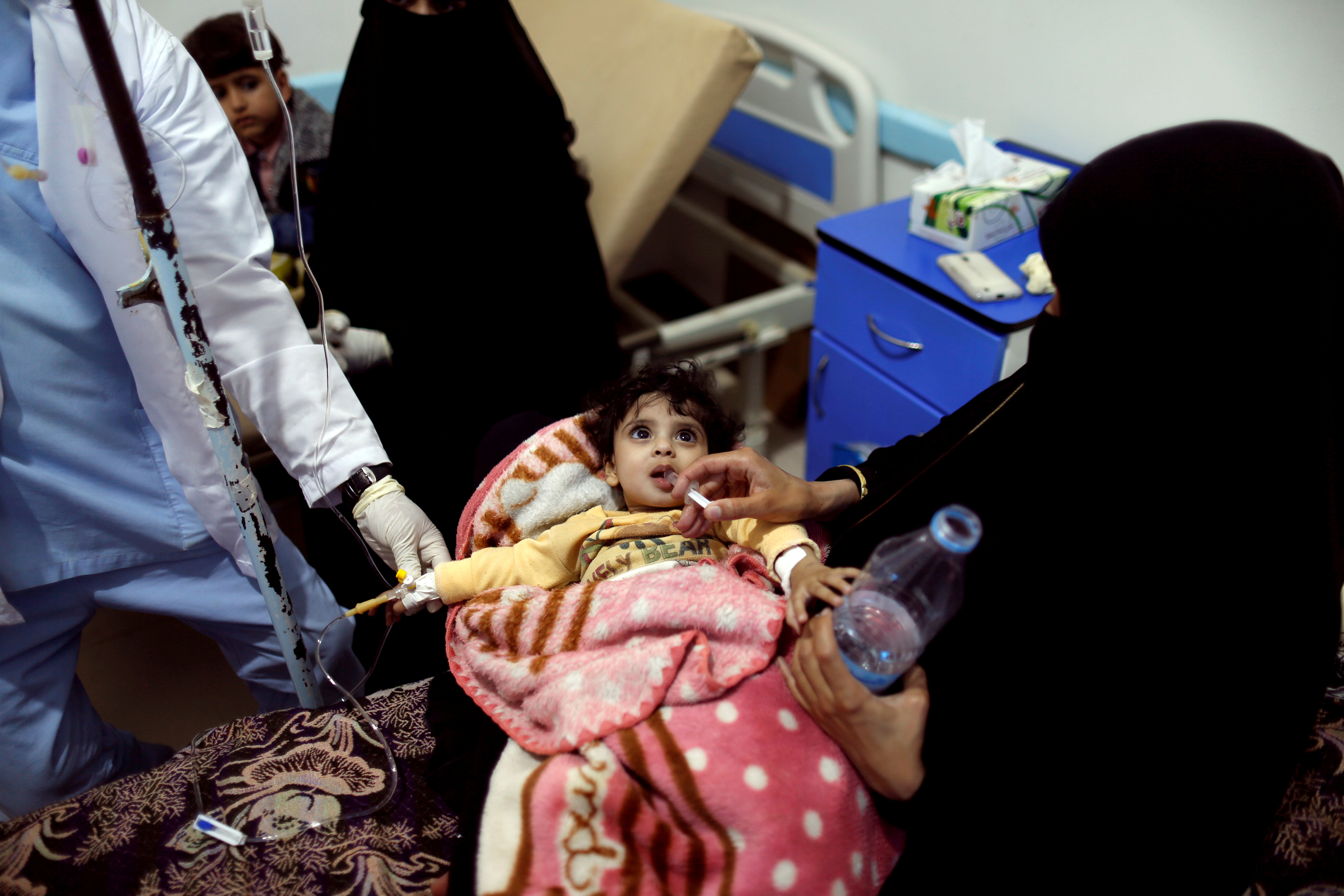 Unpaid doctors and nurses fight largest cholera epidemic on record ...