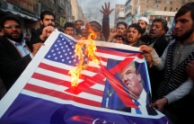 ISIS, also known as the Islamic State, has adopted a hand gesture of a ...