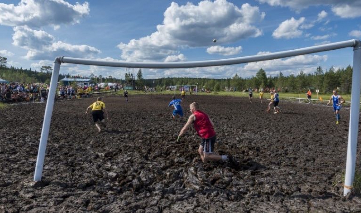 In waist-deep mud, soccer played in slow motion at swamp World Cup ...