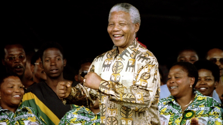Nelson Mandela's love of dancing and music is seen in this photo ...