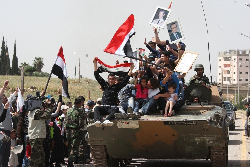 Soldiers in Syria fire on country's secret police amid crackdown on ...