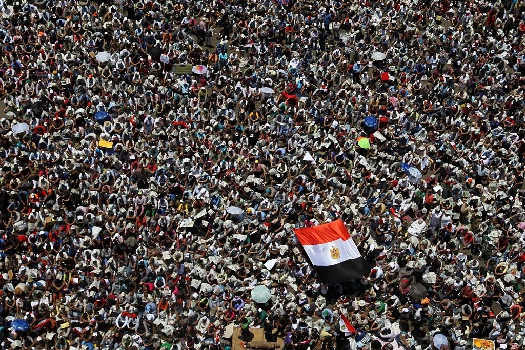 Thousands gather in Tahrir Square ahead of pro-reform protests - The ...