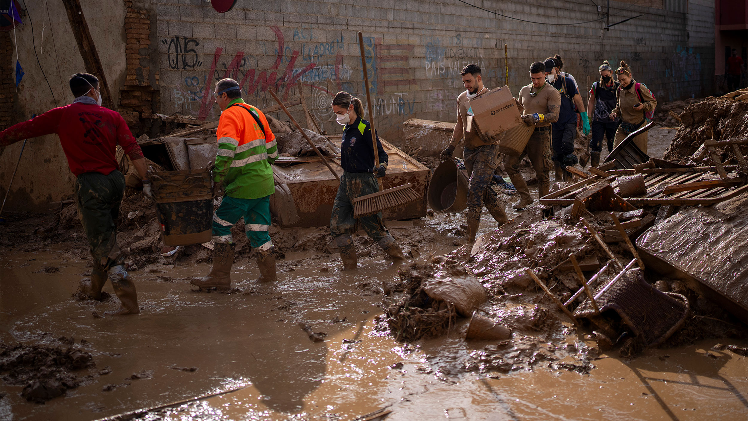 Residents in Spain's Valencia region reeling from record-breaking ...